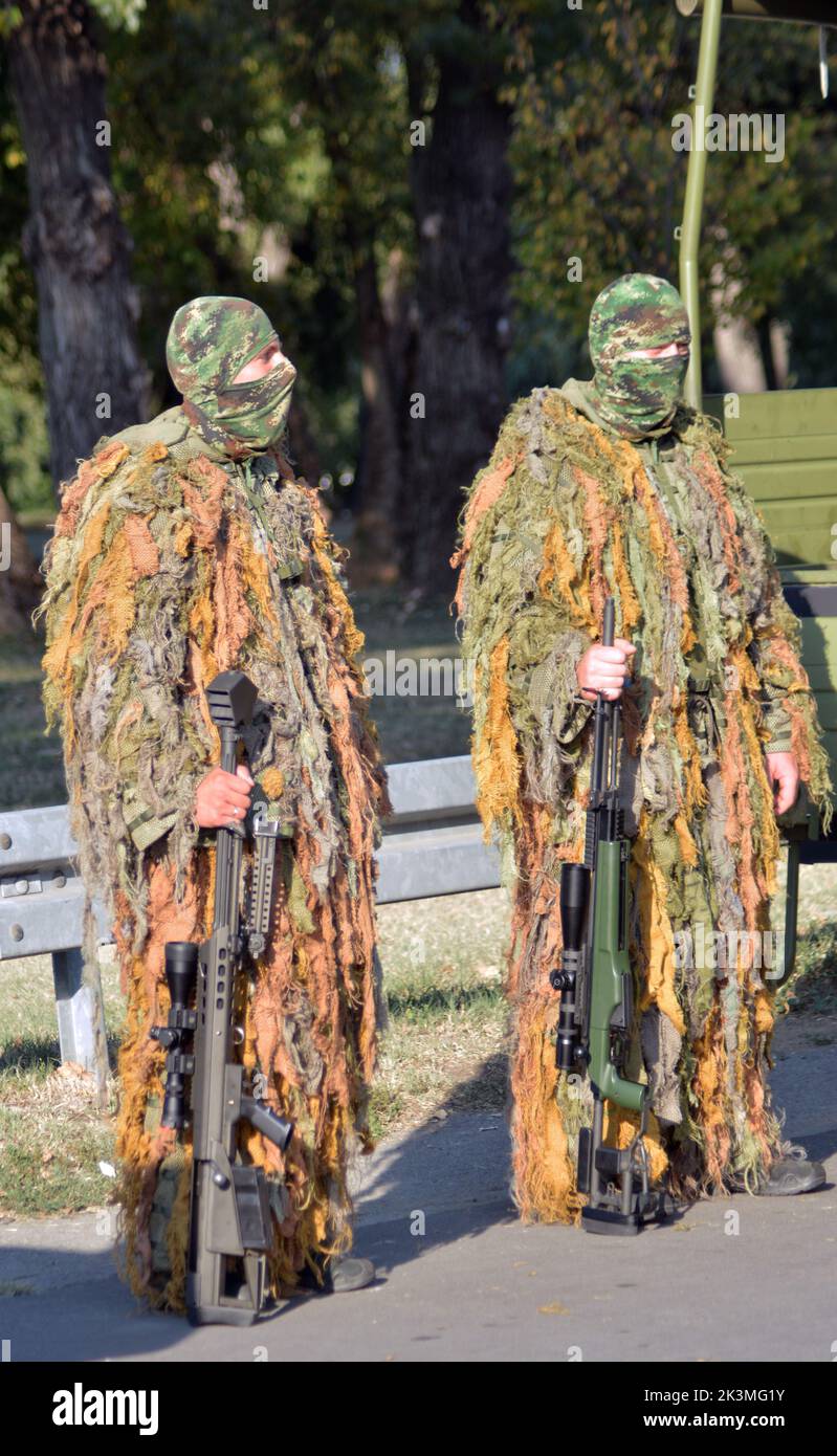 masked armed soldiers at free open air military exhibition Stock Photo ...