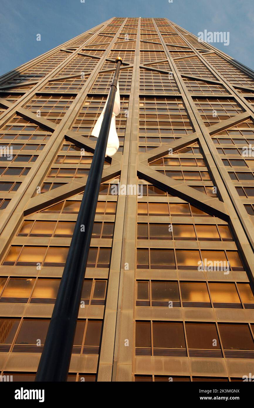 The John Hancock Building in Chicago appears to extend up into the sky ...