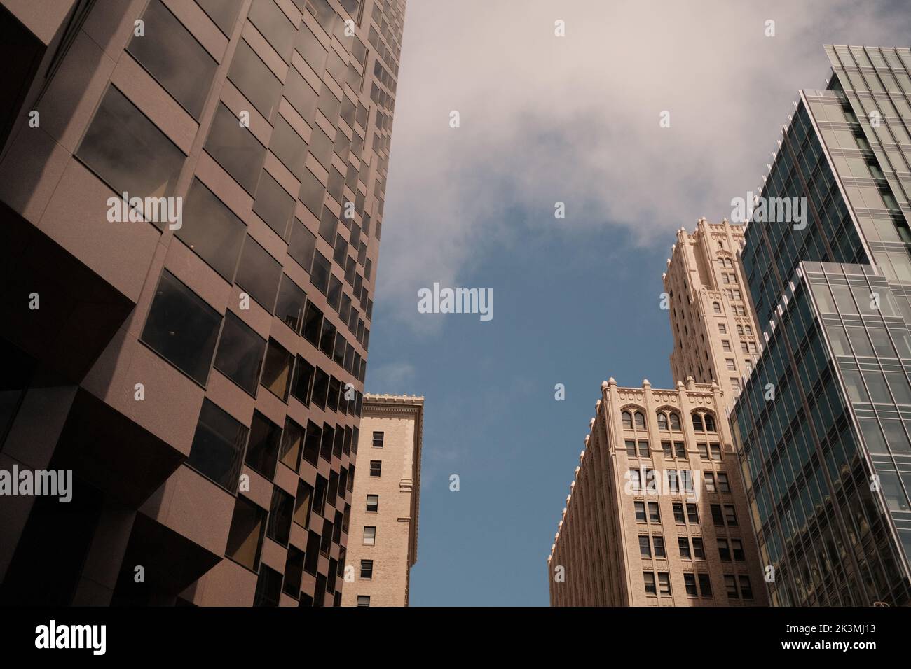 A low-angle shot of modern buildings in San Francisco downtown during ...