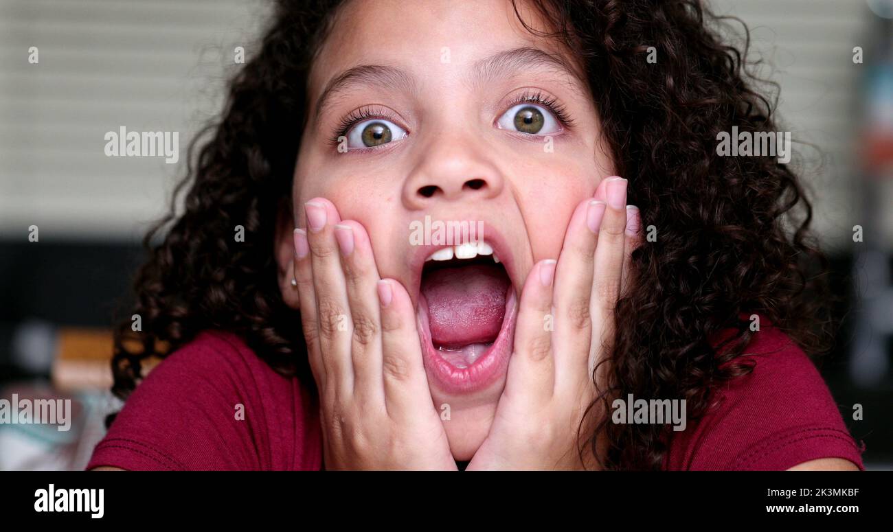 Preteen child shock surprise reaction. Girl amazement emotion Stock ...