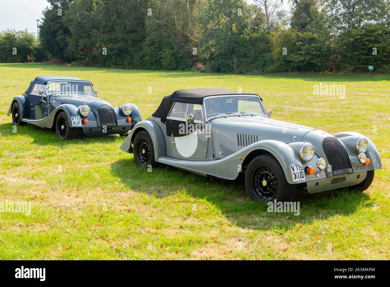 new convertible classic blue and gray morgans parked in field at the ...