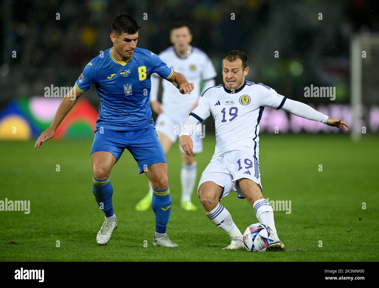 Ukraine's Ruslan Malinovsky (left) and Scotland's Ryan Fraser battle ...