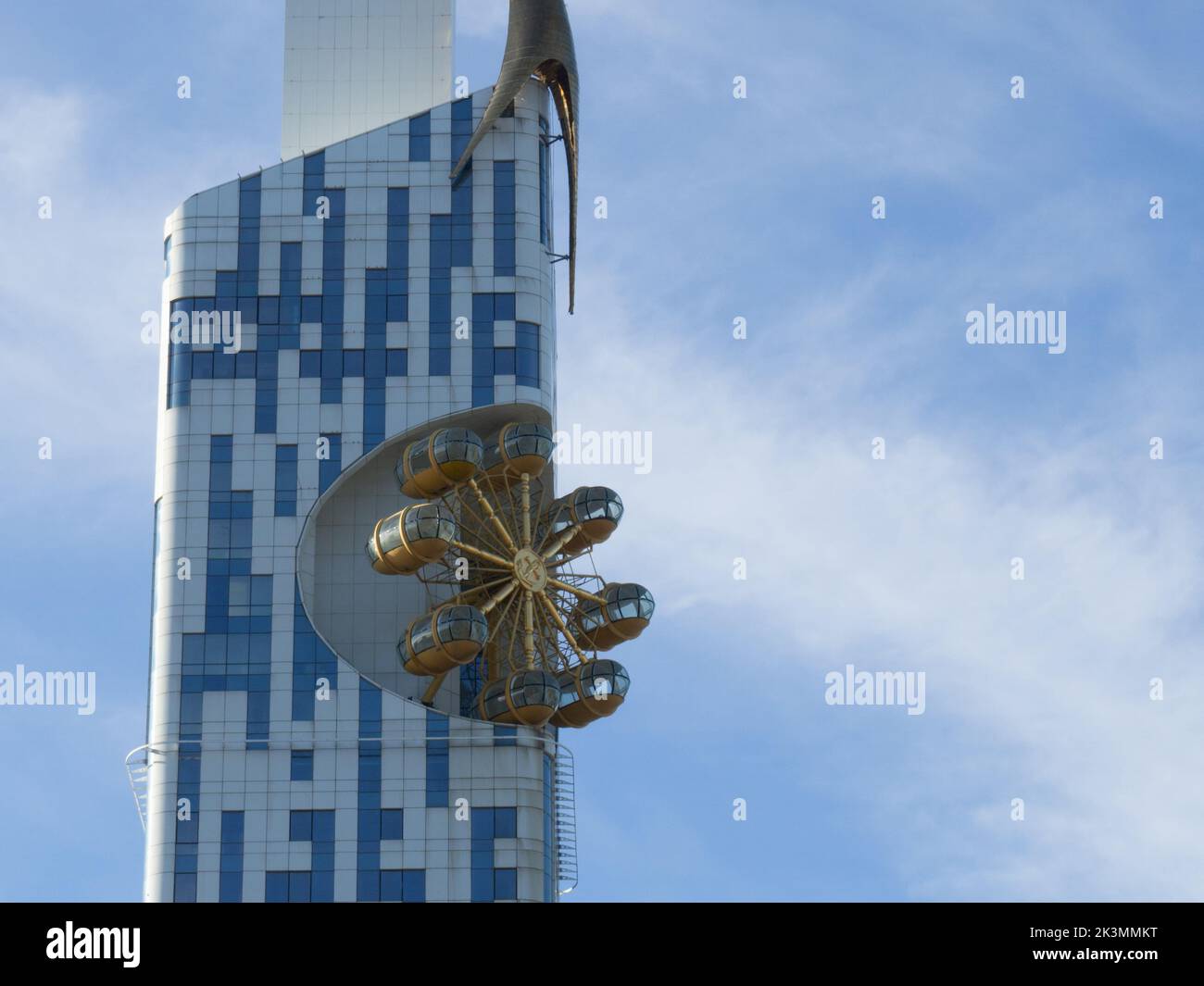Batumi architecture. Carousel on a high-rise building. Ferris wheel ...