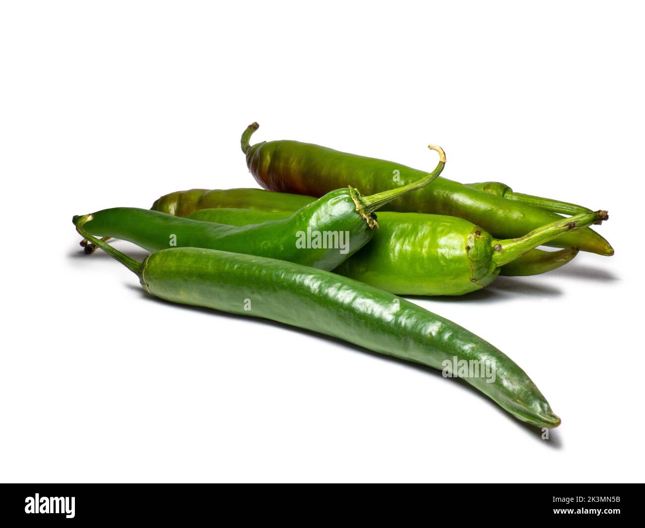 Fresh green chili peppers. Spicy vegetable isolate. Peppers on a white ...