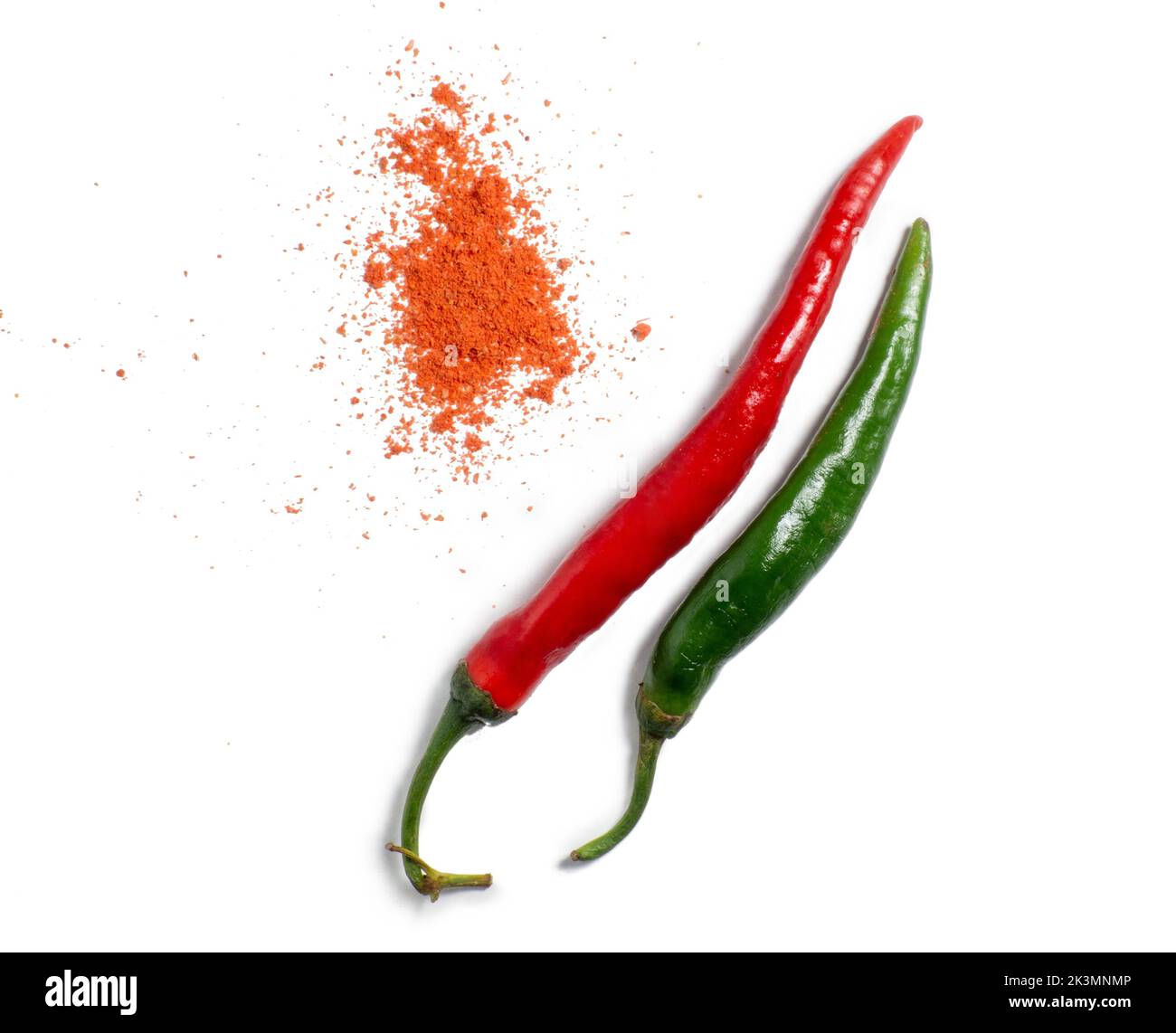 The green pepper and ground red pepper are isolated. Spicy pepper on a ...