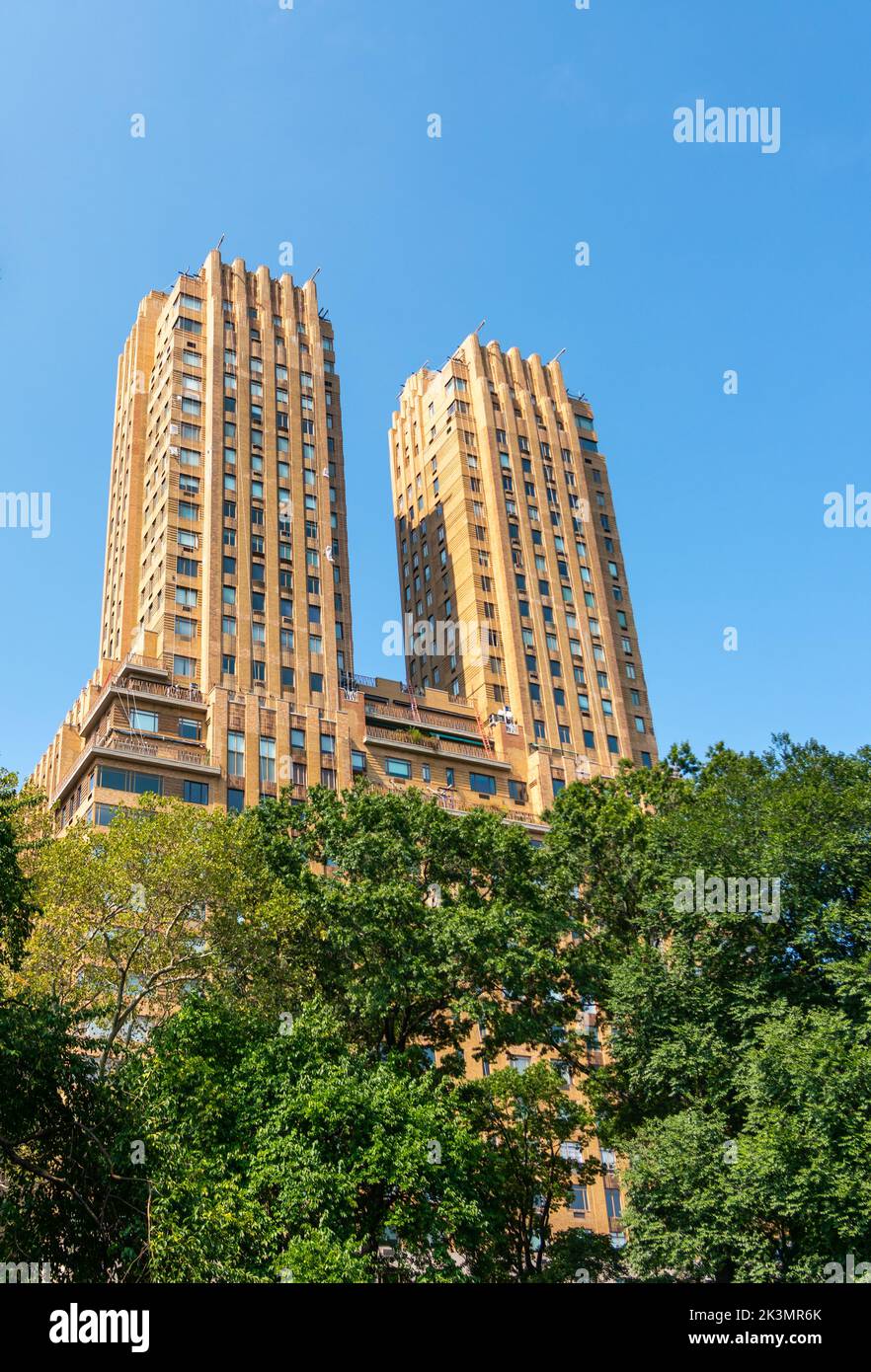 Towering towers of the Majestic apartments above the green trees of ...