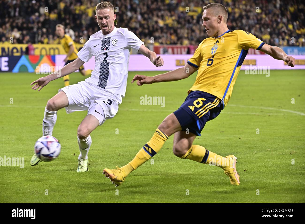 Slovenia's an Karnicnik and Sweden's Ludwig Augustinsson during the ...