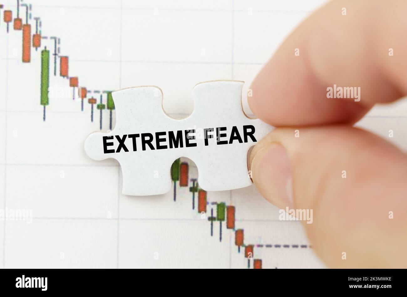 Business concept. Against the background of the quotes chart, a puzzle ...