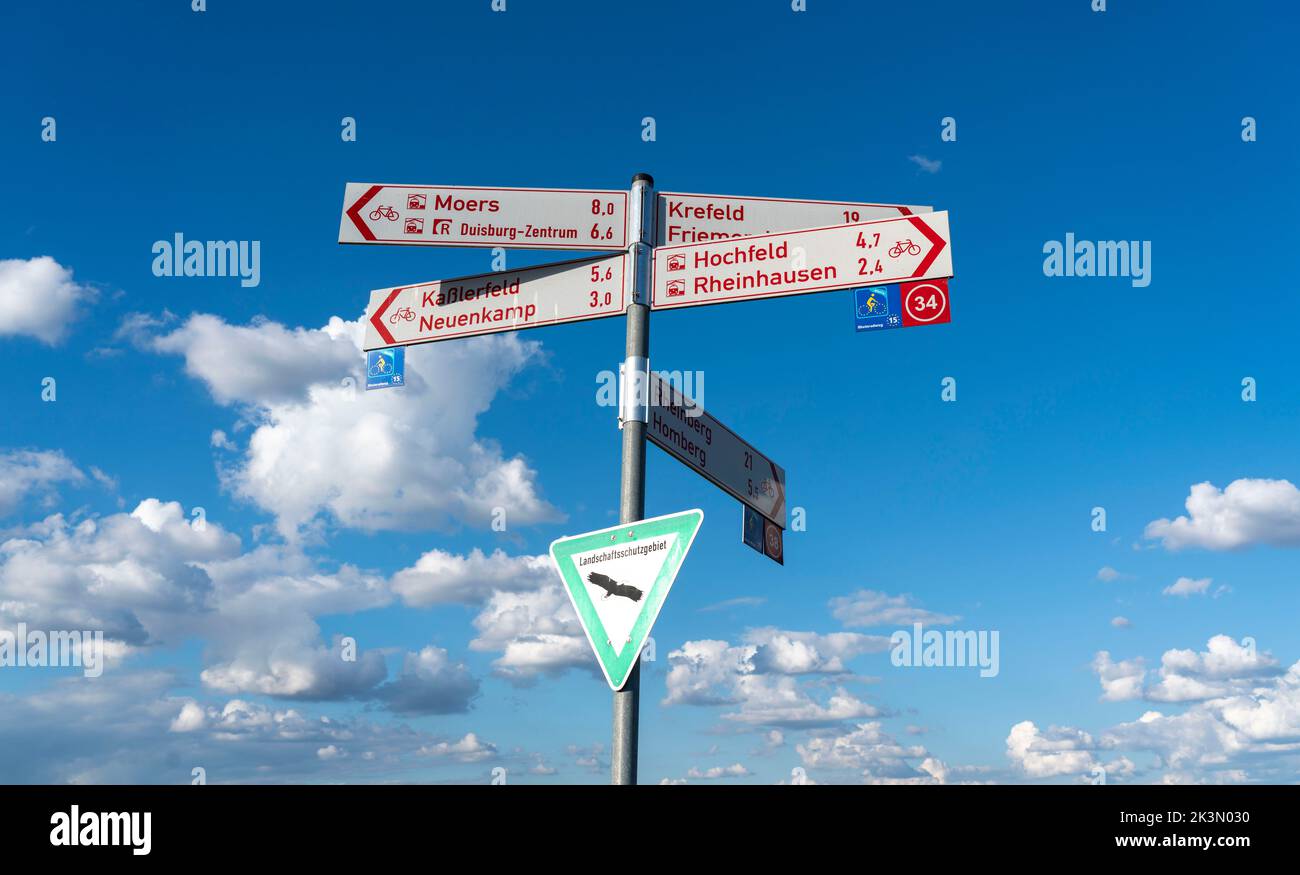 Cycle path signpost in the Rhine meadows Duisburg-Rheinhausen, NRW ...