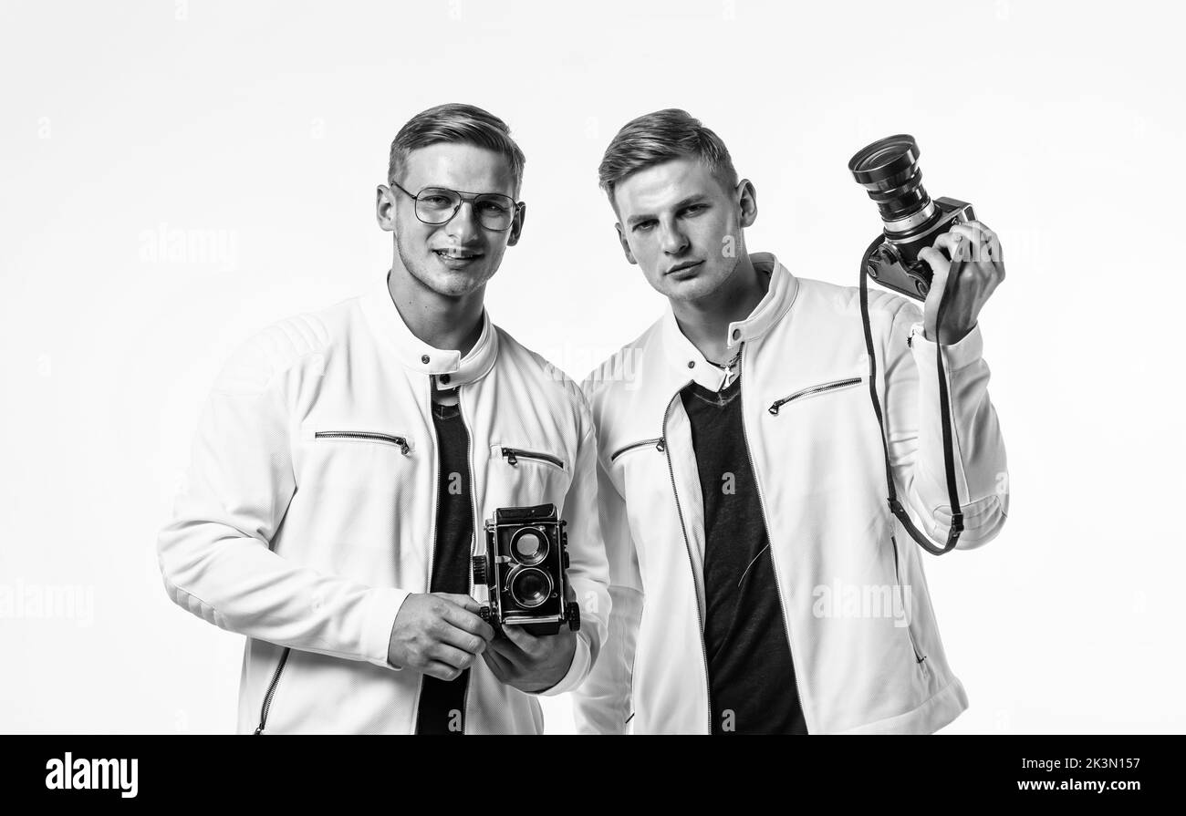 male friendship. men friends. two cousin with retro photo camera. young ...