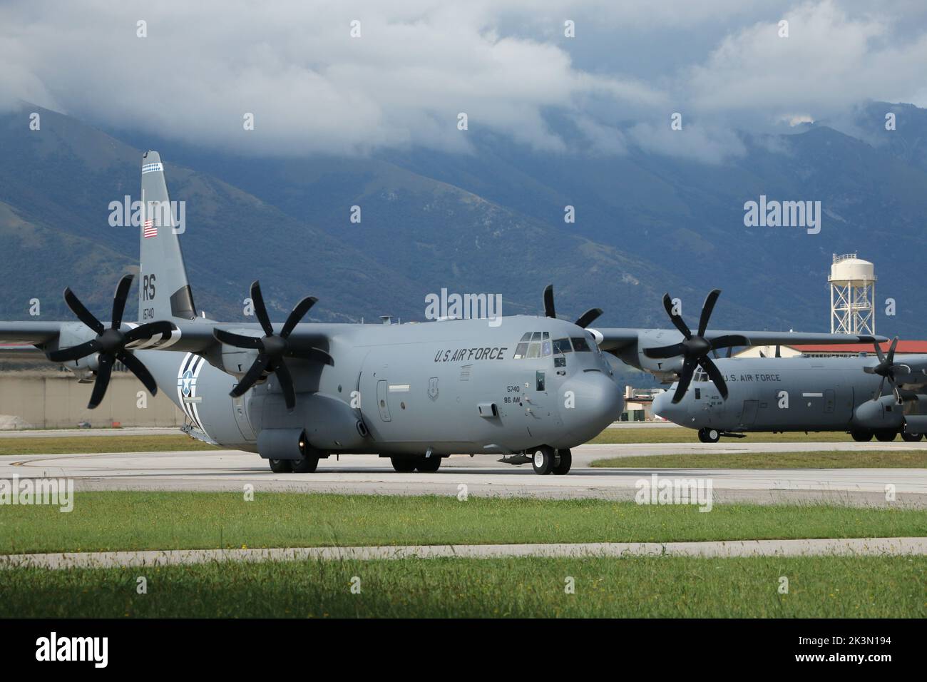 Two Airforce C-130's Taxi down the runway on Aviano Airbase, Italy ...