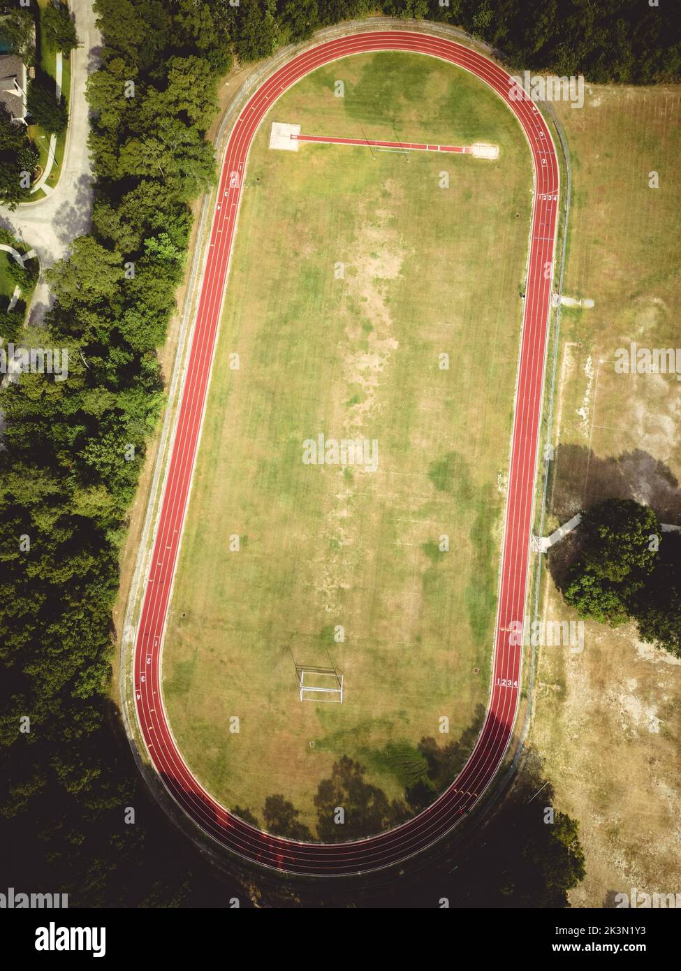 A vertical aerial of a middle school running track during daytime Stock ...