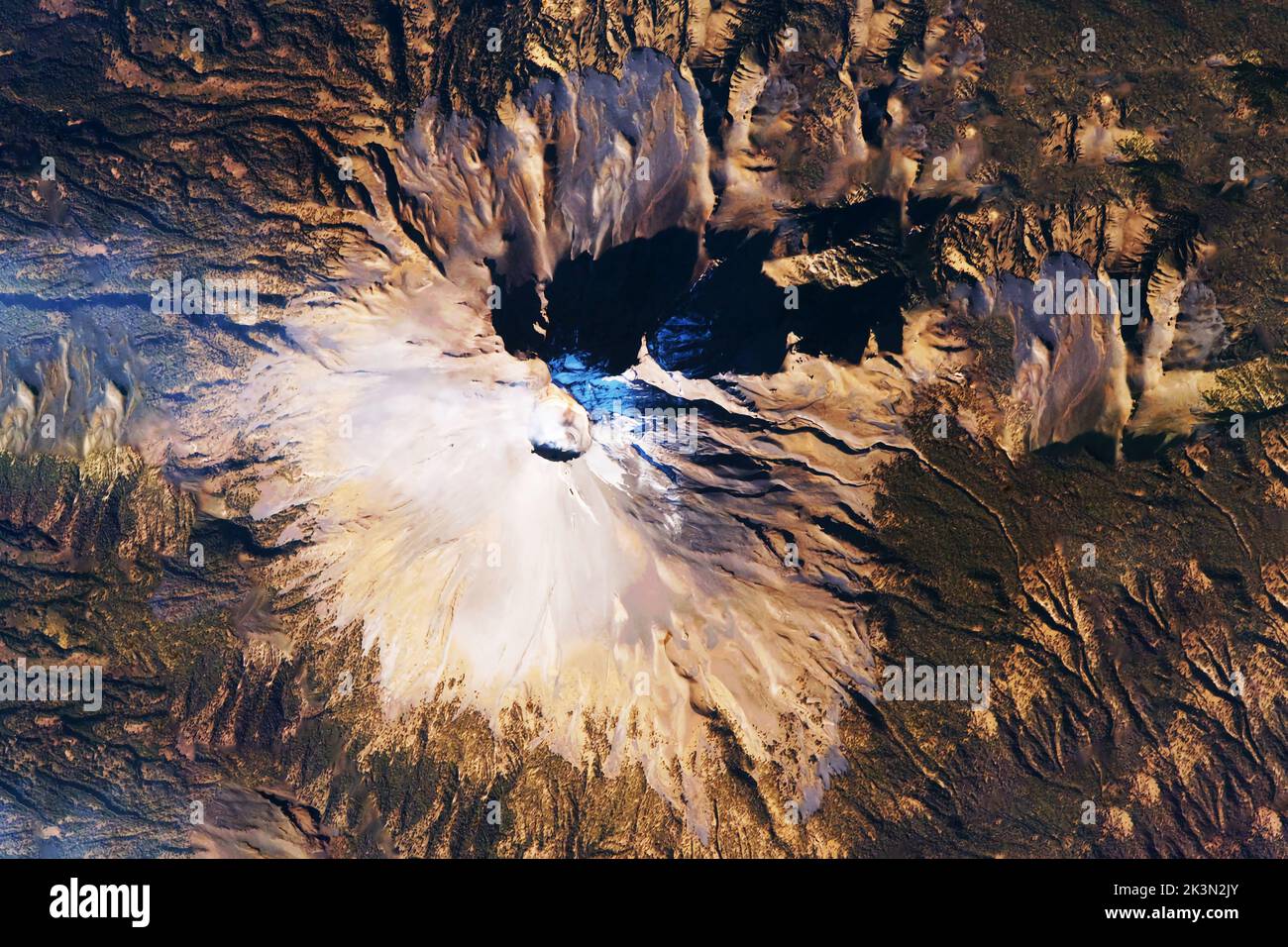A volcano from outer space. Elements of this image furnished by NASA ...