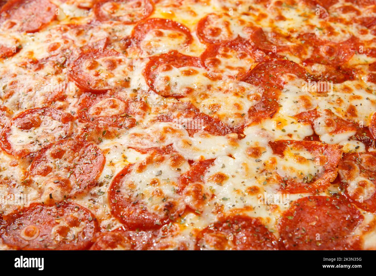 Pizza background - macro shot of italian Pepperoni pizza. It can be ...