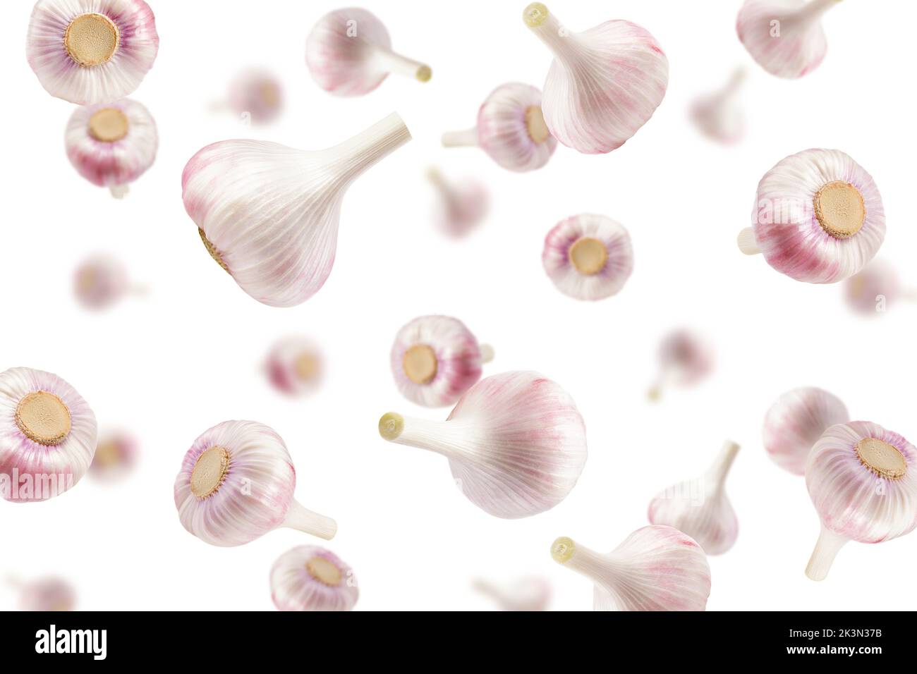 Falling garlic, isolated on white background, selective focus Stock ...