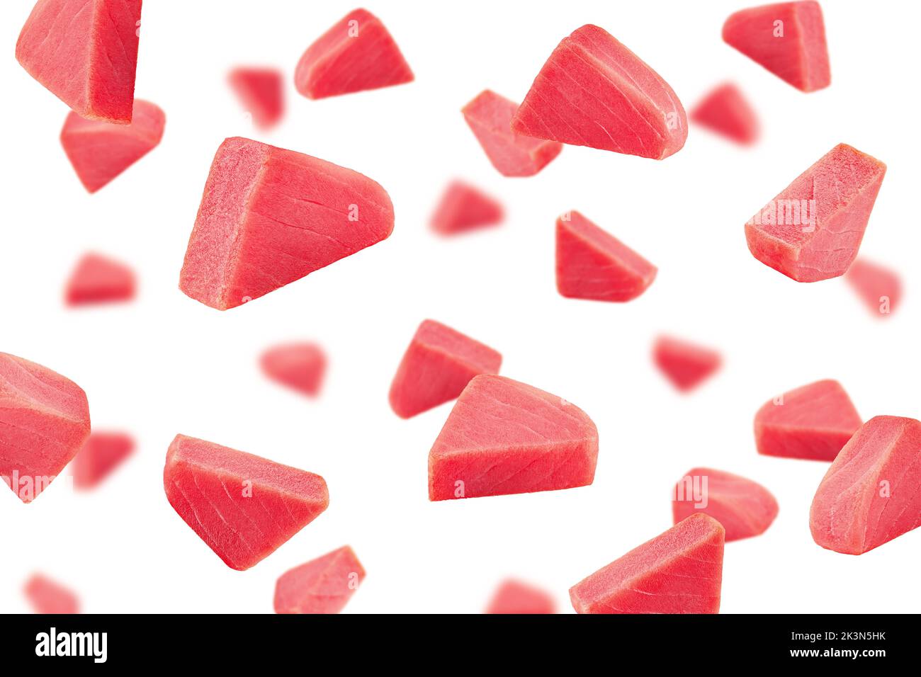 Falling raw tuna steak, fish isolated on white background, selective ...