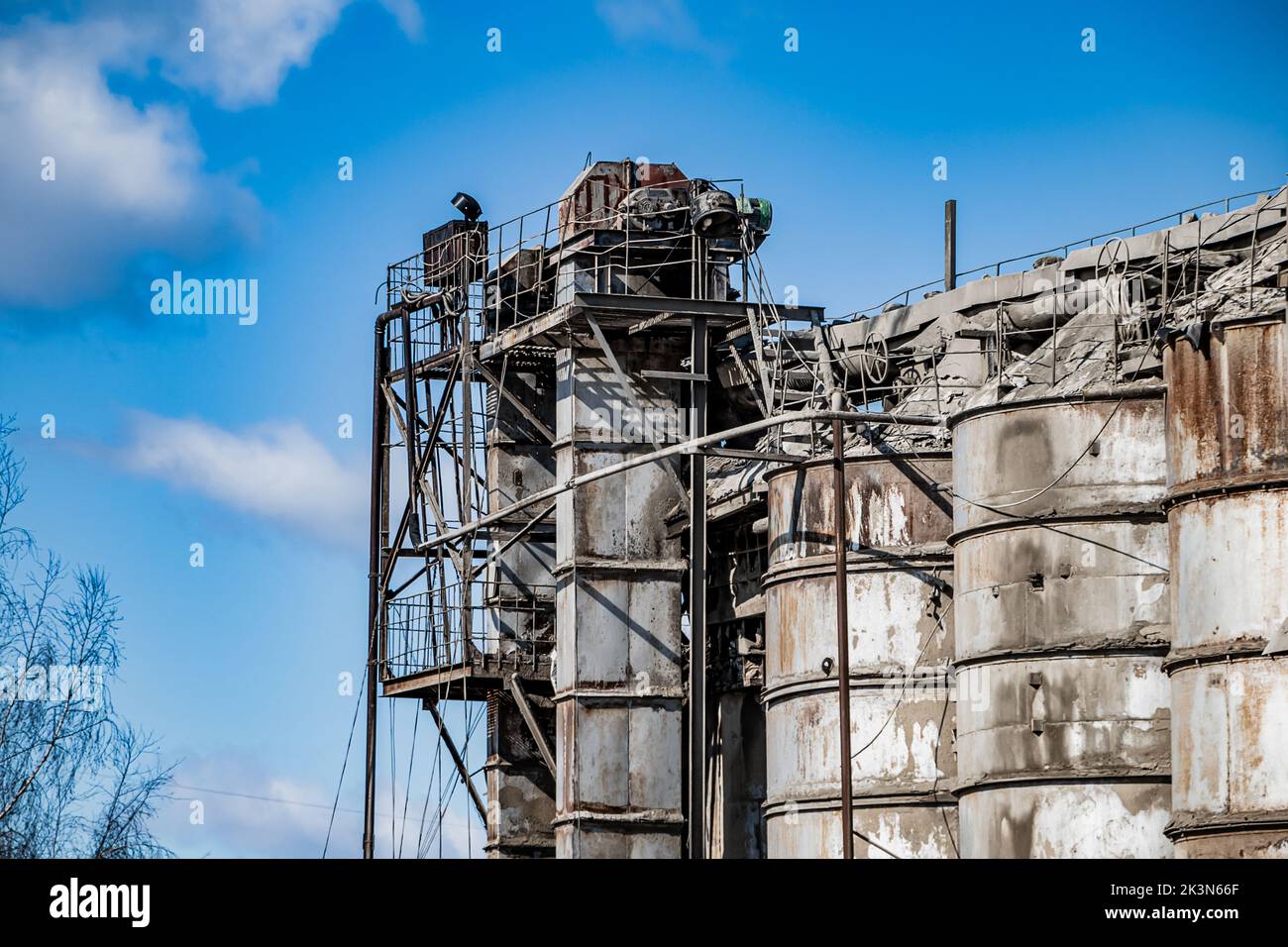 Old destroyed construction site. Rusty scaffolding and construction ...