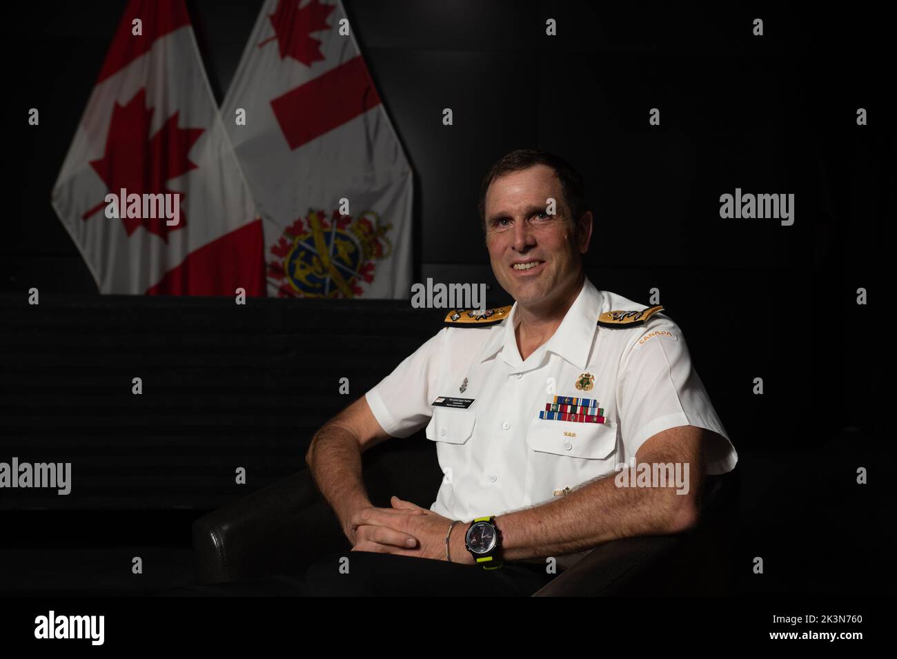 Vice-Admiral Angus Topshee speaks with a reporter during an interview ...
