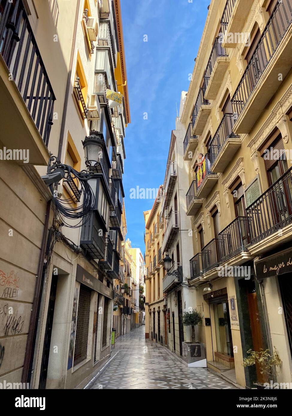 typical narrow Spanish and magnificent street in the city of Jaen ...