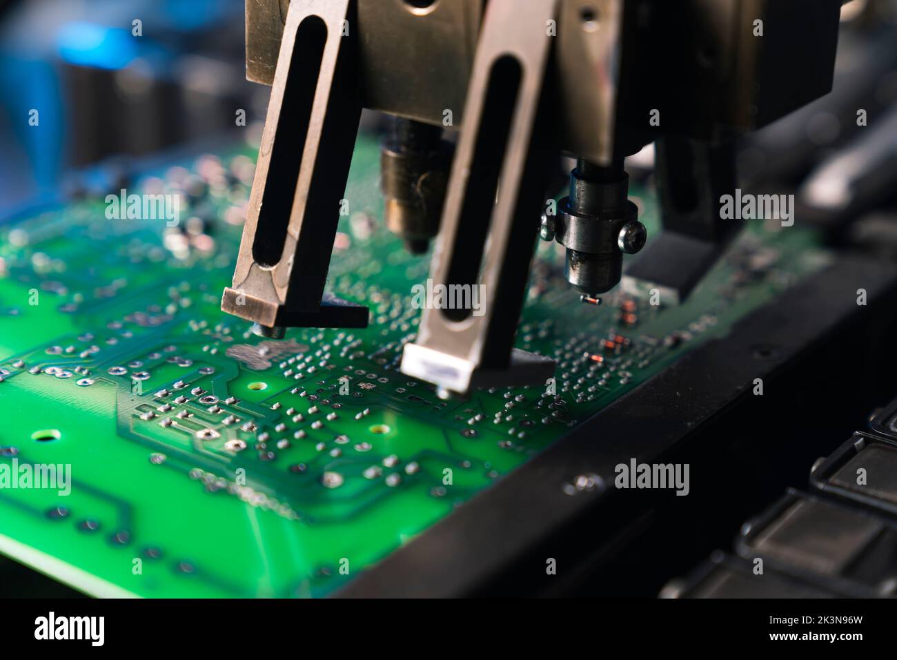 Close-up shot of SMD surface-mount device working on printed circuit ...