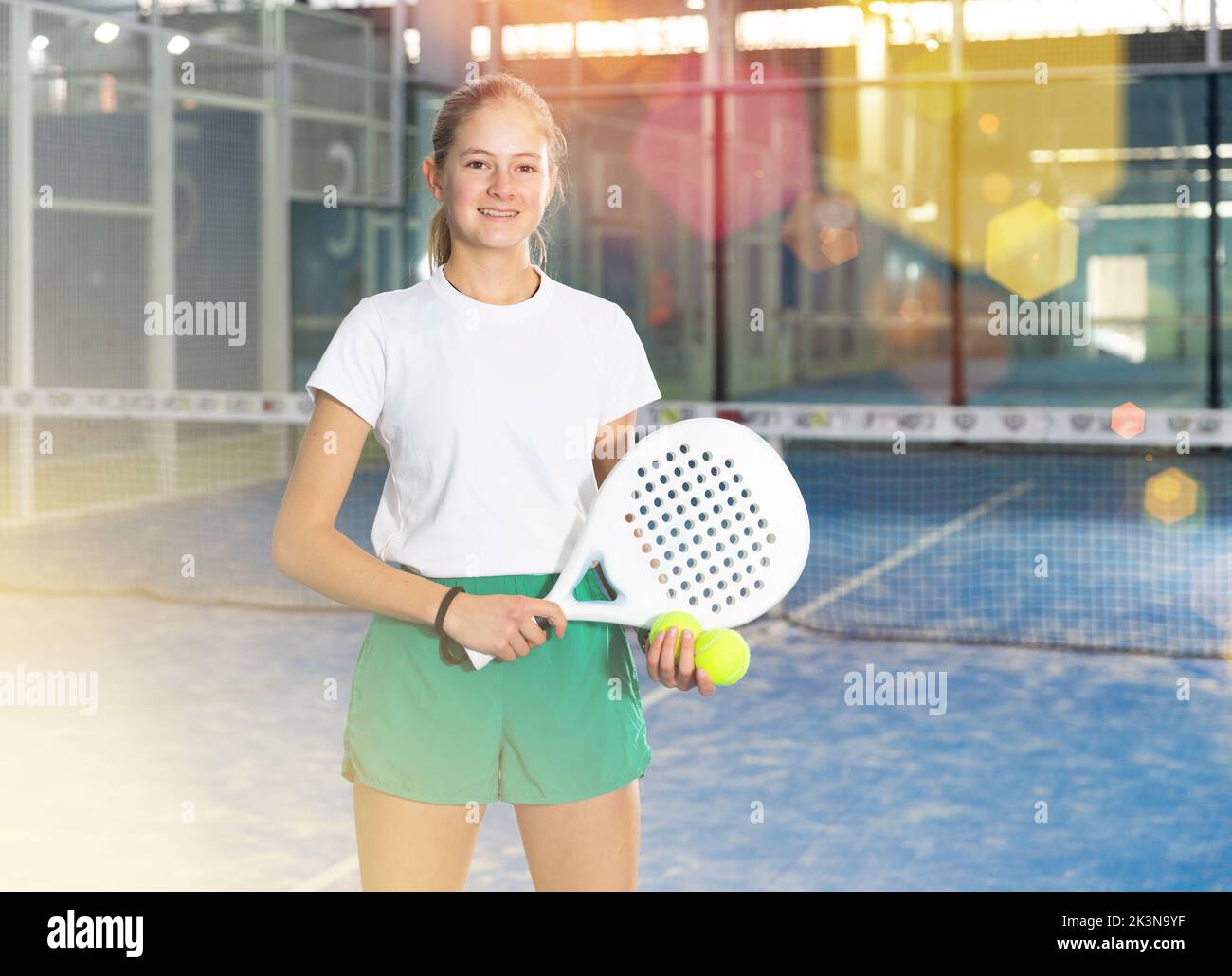 Portrait of teenage girl padel player Stock Photo - Alamy
