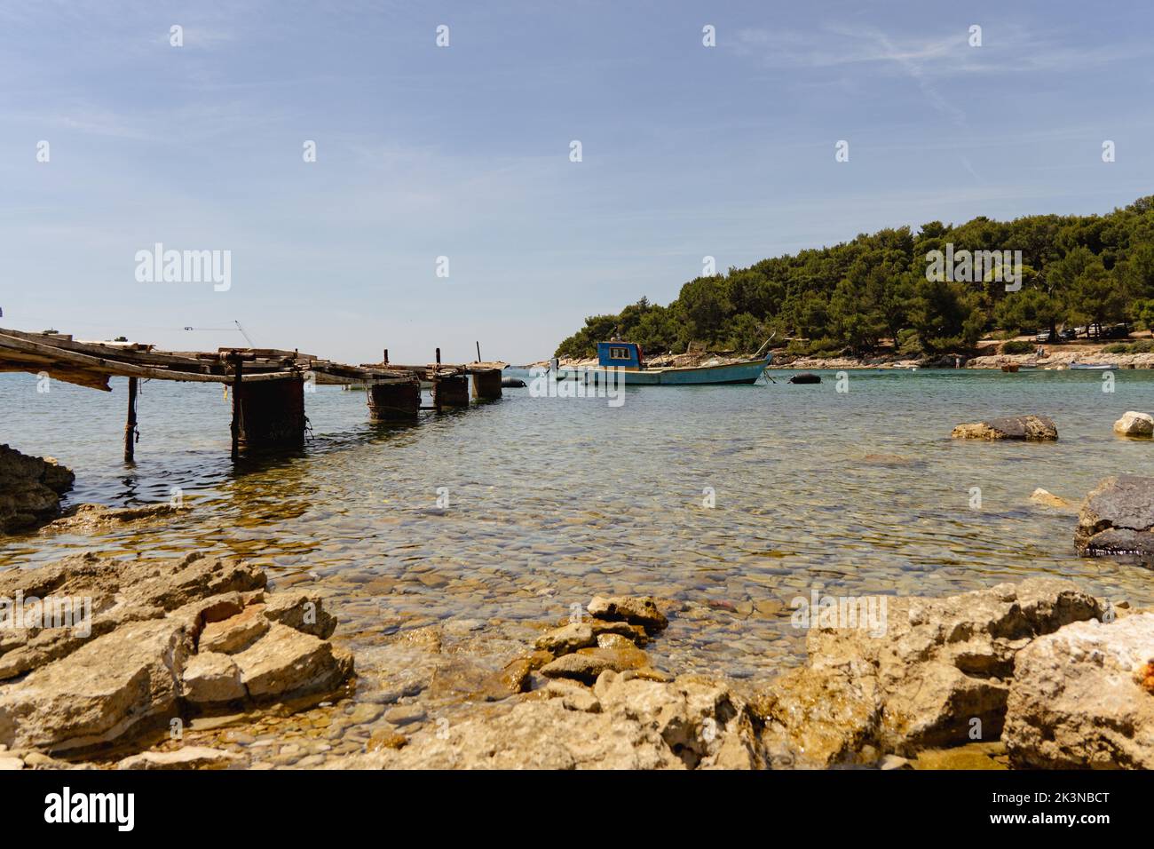 A view of an old pier next to the coastline in Pula Croatia Stock Photo ...