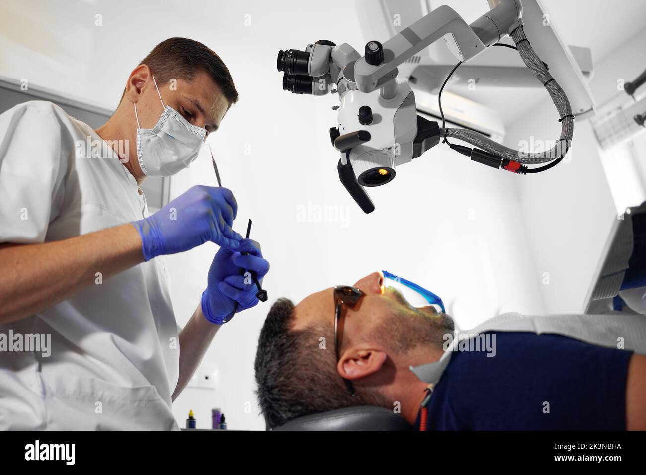 Treatment of teeth in stomatology Stock Photo - Alamy