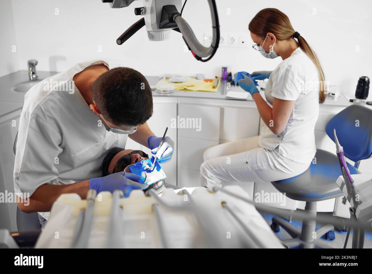 Treatment of teeth in stomatology Stock Photo - Alamy