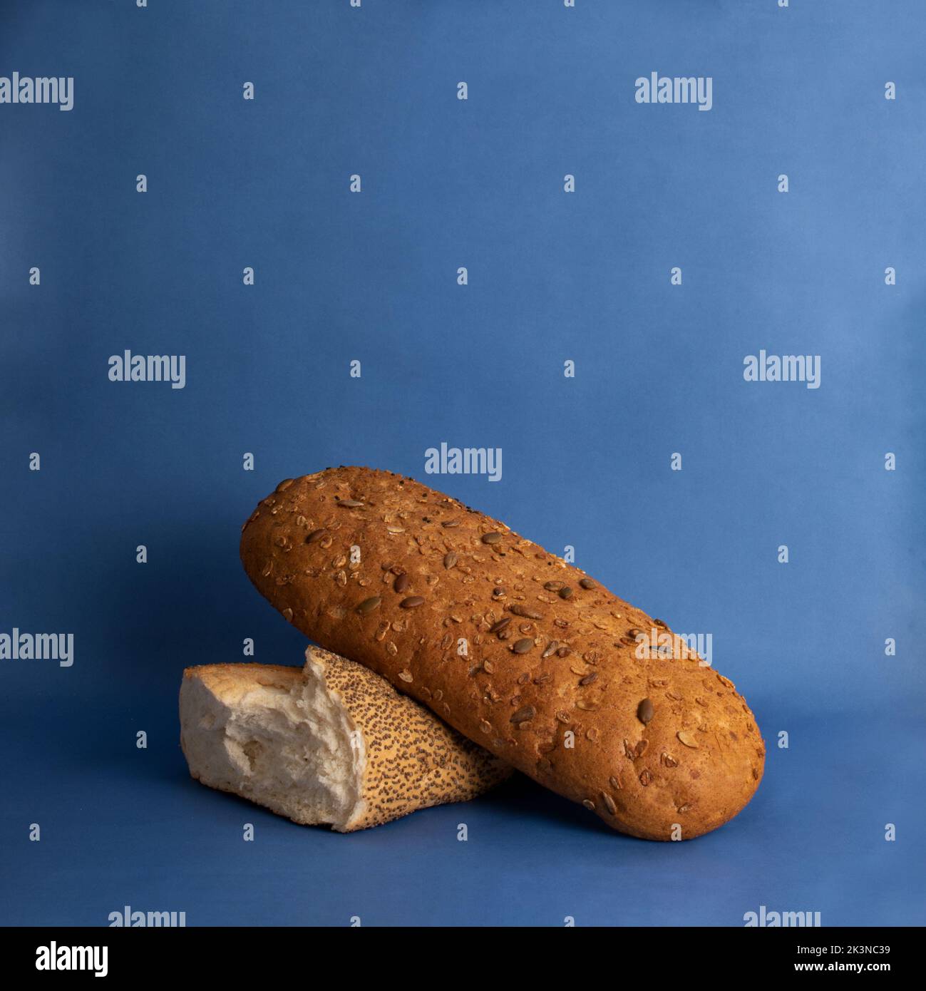 Photo of bread with blue background Stock Photo - Alamy