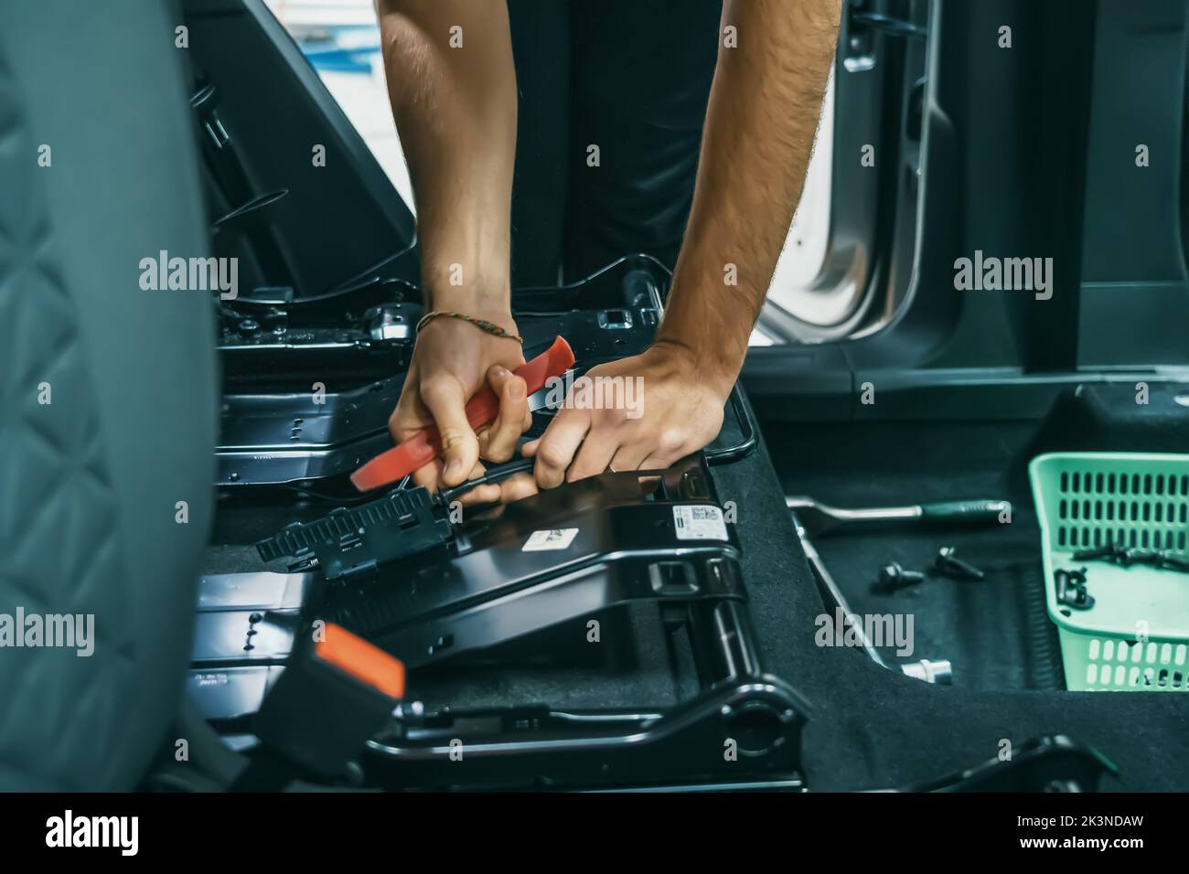 Dismantling of car interior in service garage. Auto repair and ...