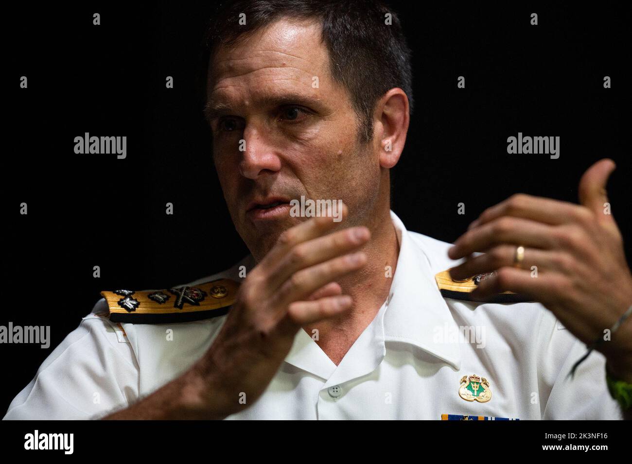 Vice-Admiral Angus Topshee speaks with a reporter during an interview ...