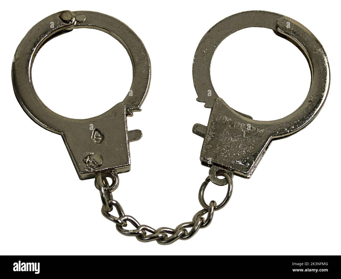 Toy handcuffs hi-res stock photography and images - Alamy