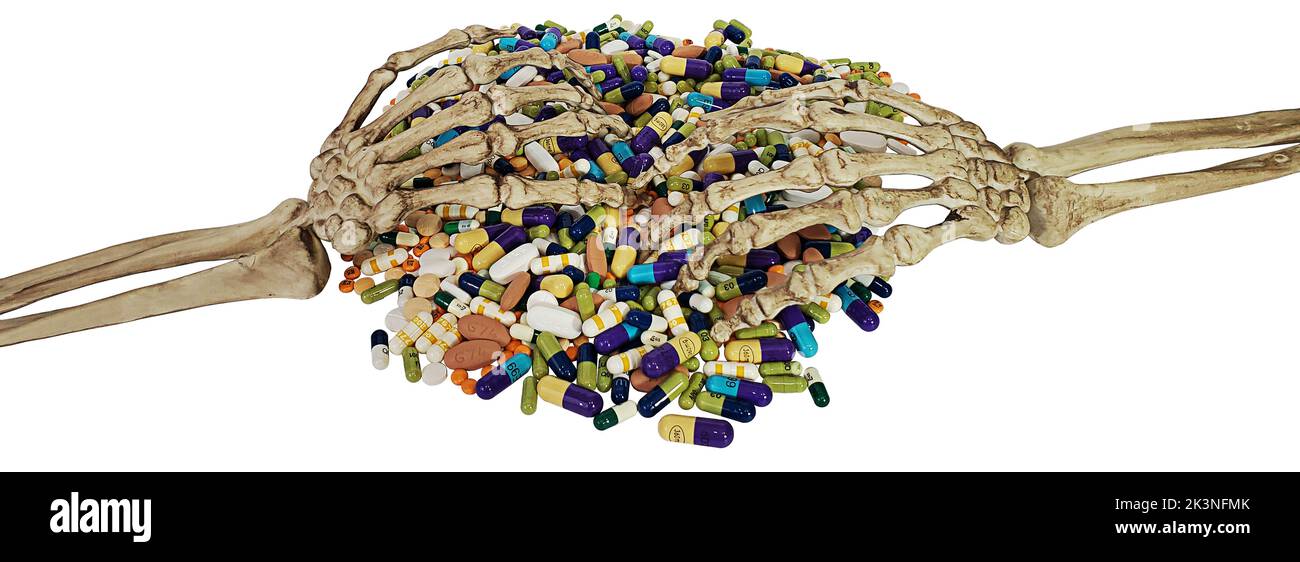 Skeleton hands on a pile of pills to show the dangers of drug addiction ...