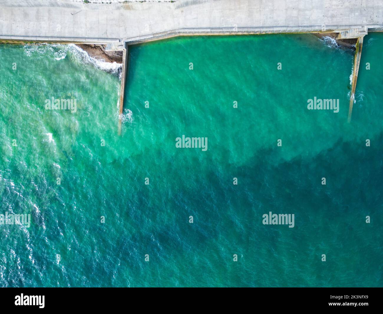 High res drone photo flying over the beach and shoreline Stock Photo ...