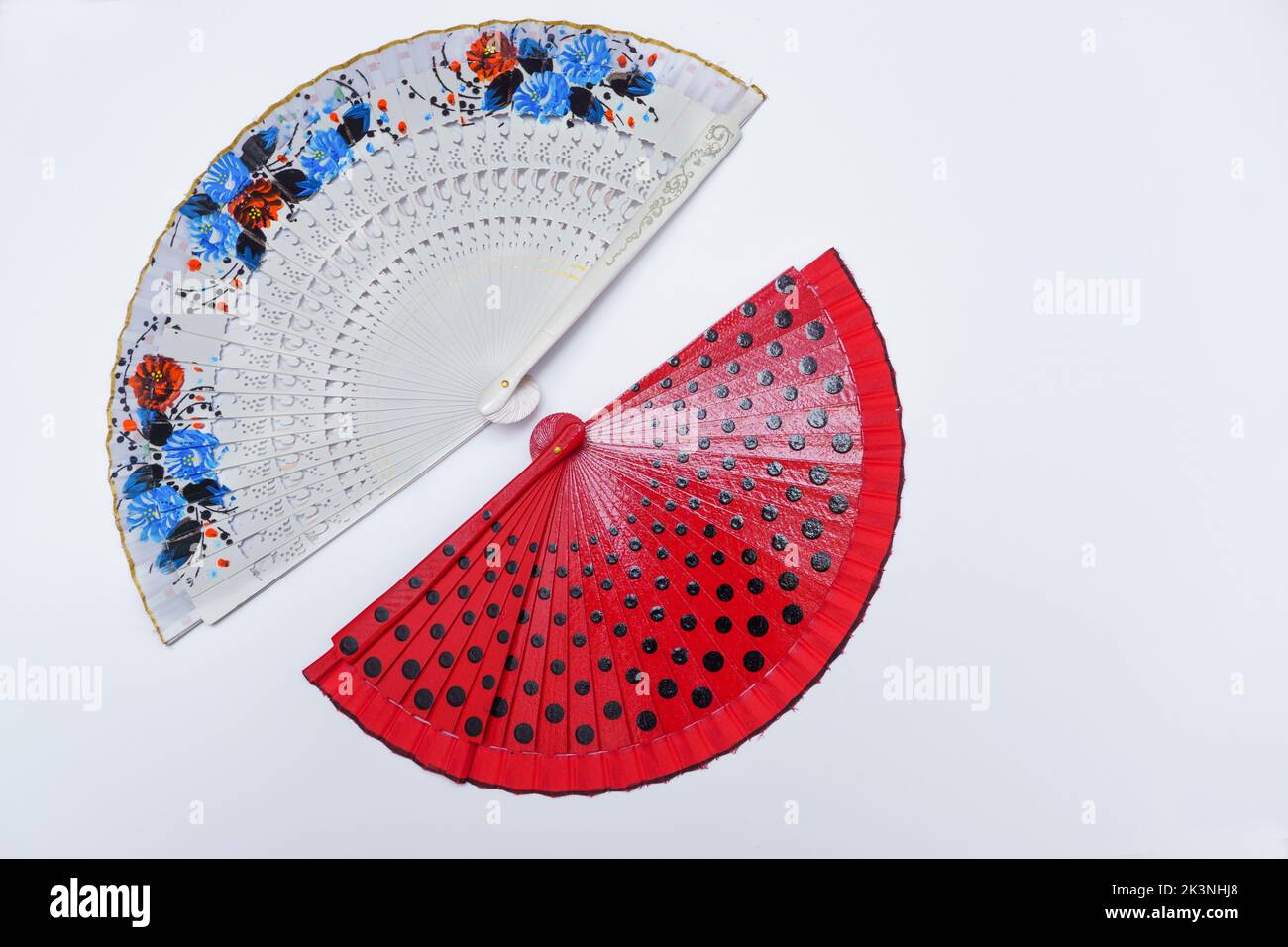 two hand painted handmade fans on white background Stock Photo - Alamy