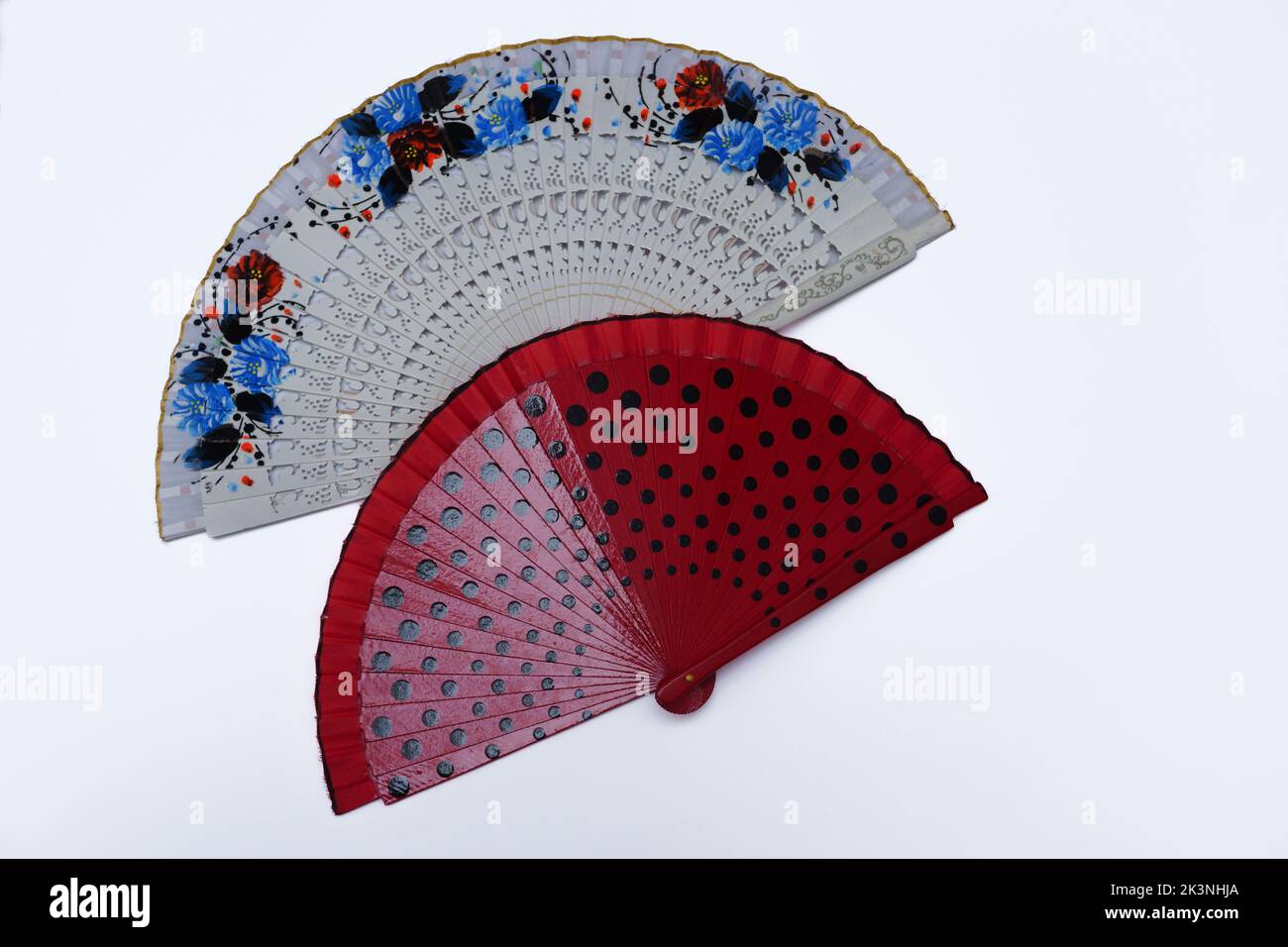 two hand painted handmade fans on white background Stock Photo - Alamy