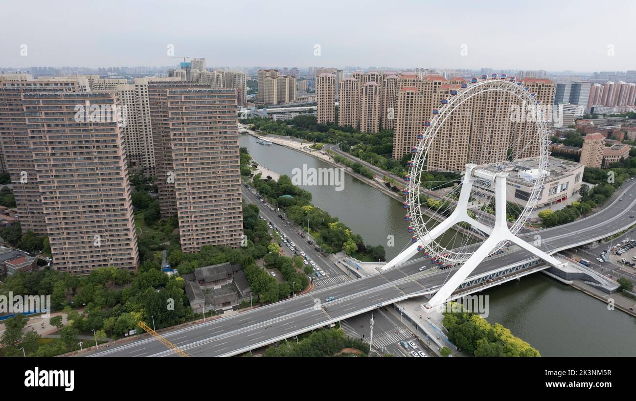 Tianjin Eye, Ferris Wheel on Yongle Bridge of Haihe River, Tianjin ...