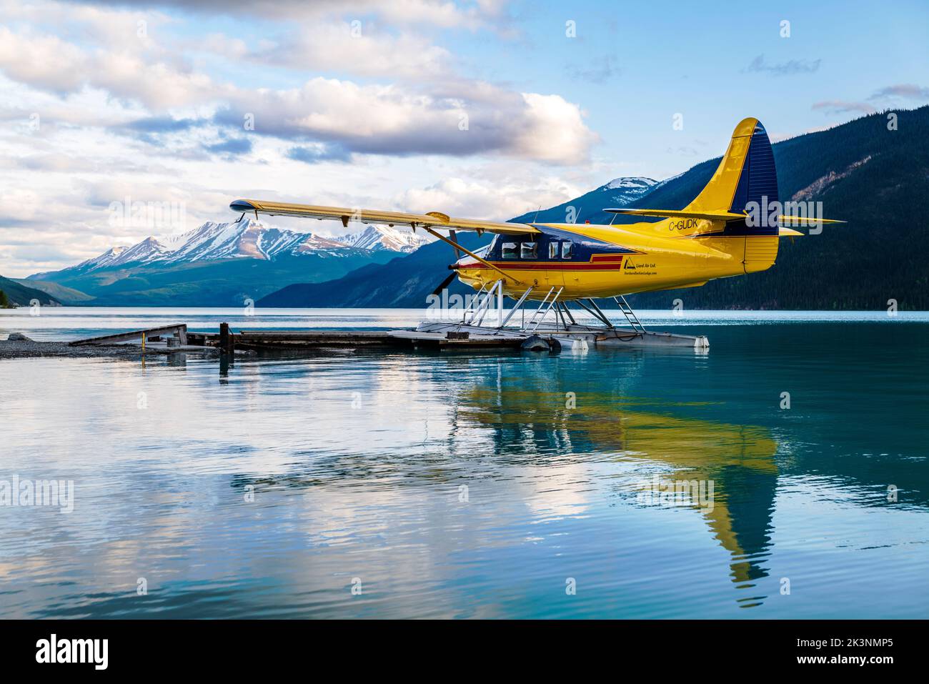 Float planes; Northern Rockies Mountain Lodge; Muncho Lake; surrounded ...