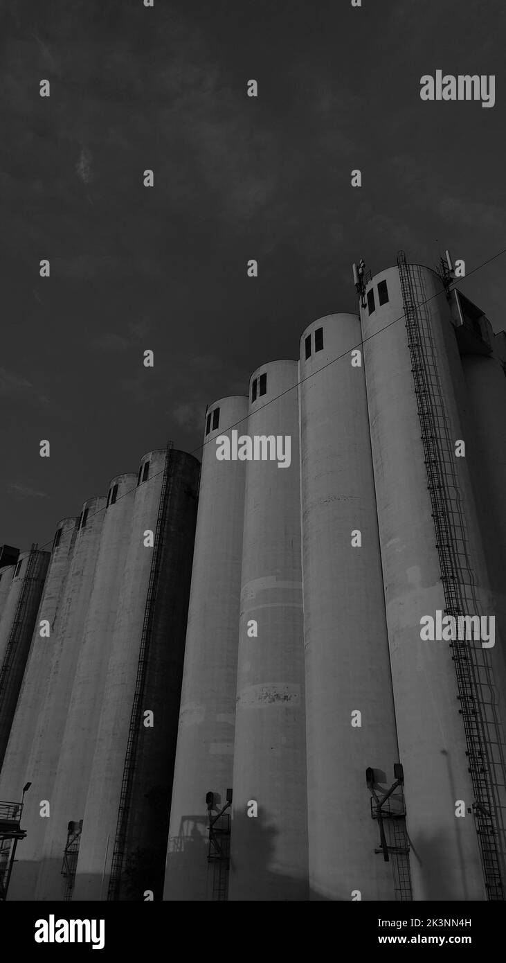 A low-angle vertical shot of a factory Stock Photo - Alamy