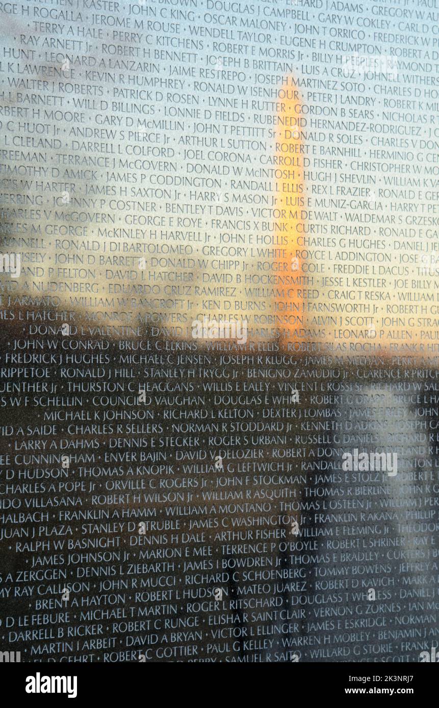 Reflections in the vietnam war memorial hi-res stock photography and ...