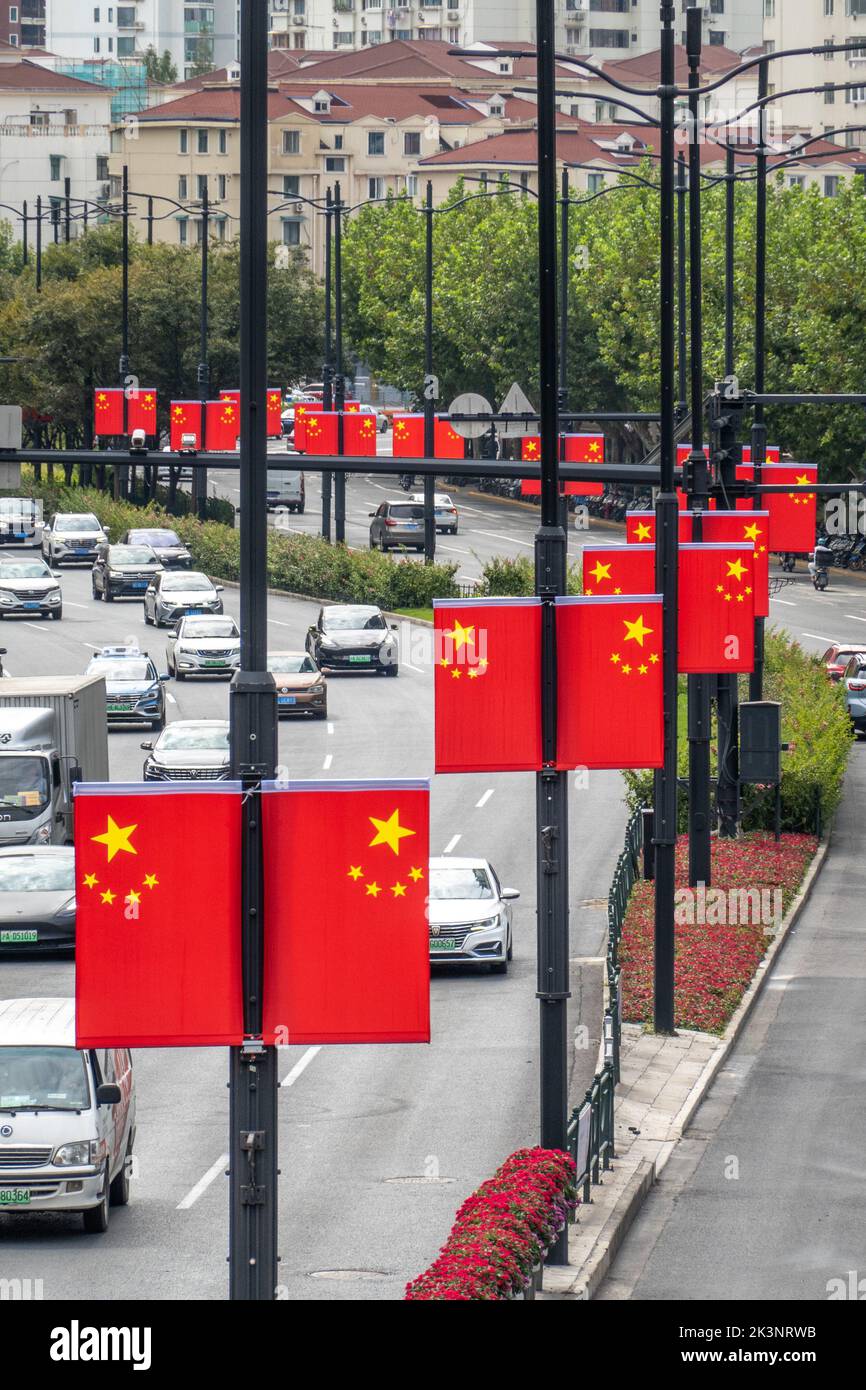 SHANGHAI, CHINA - SEPTEMBER 27, 2022 - Bright five-star red flags are ...