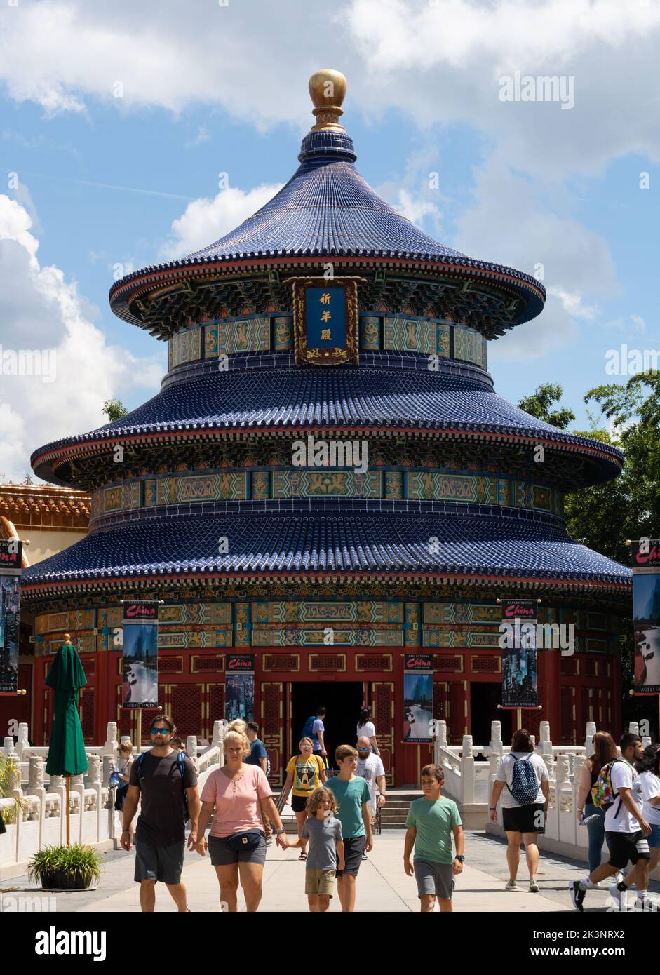 Bay lake, FL USA - September 15, 2022: Roadside view of tourists walking down the Reflections of ...