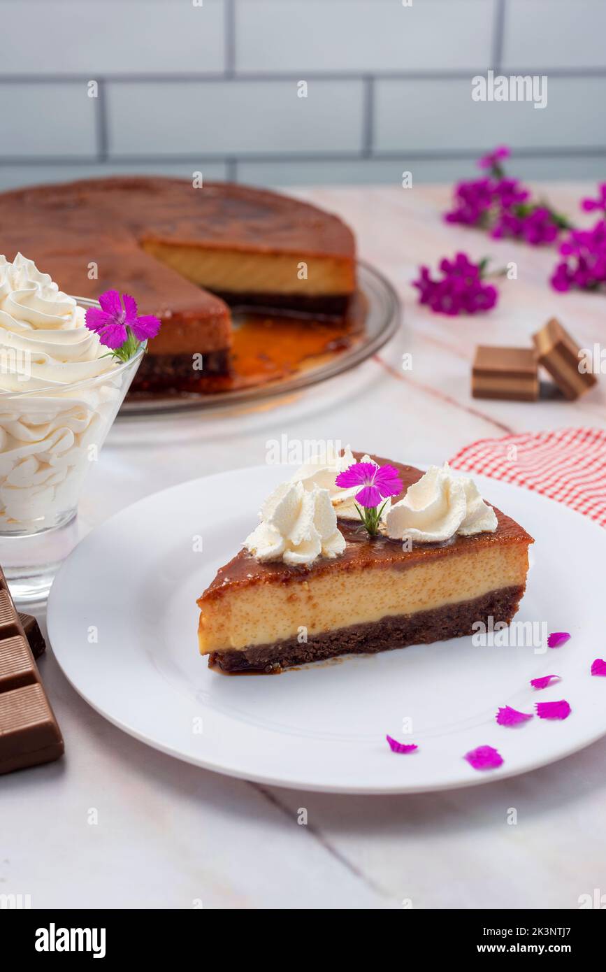 A closeup shot of a chocolate and flan dessert, inverted cake with ...