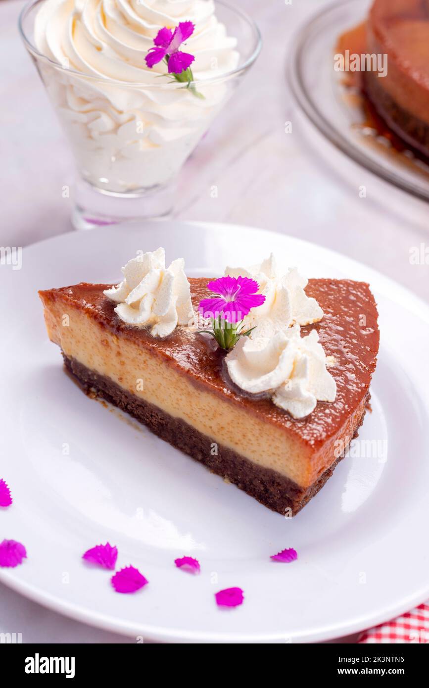 A closeup shot of a chocolate and flan dessert, inverted cake with ...