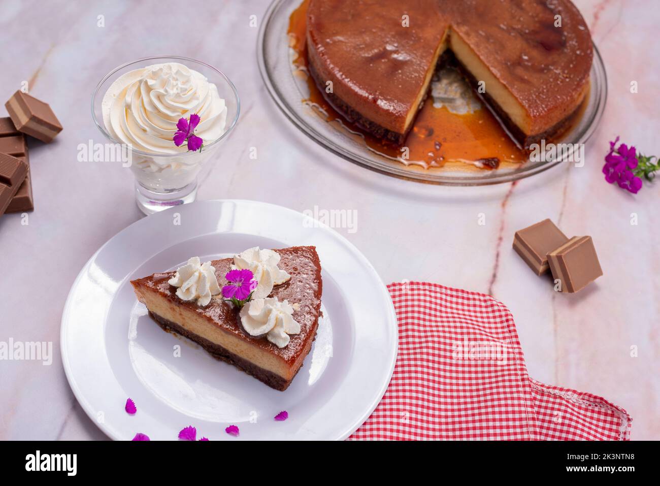 A closeup shot of a chocolate and flan dessert, inverted cake with ...