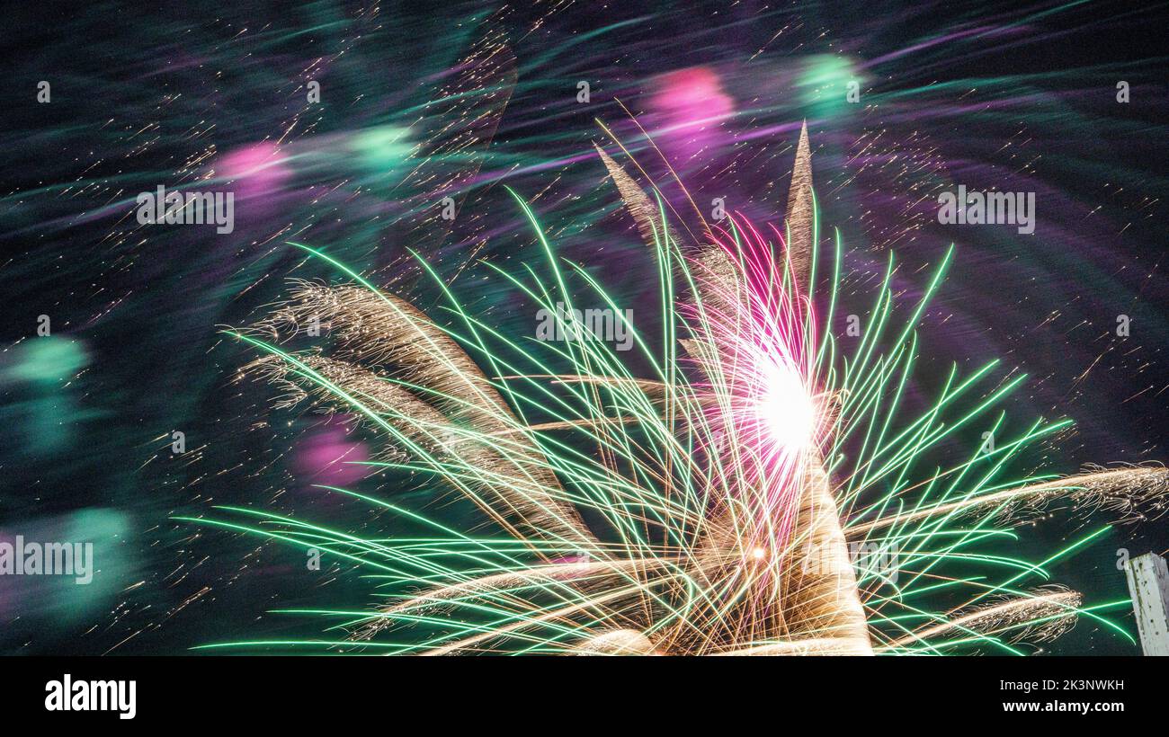 The beautiful colorful firework in the night sky Stock Photo - Alamy
