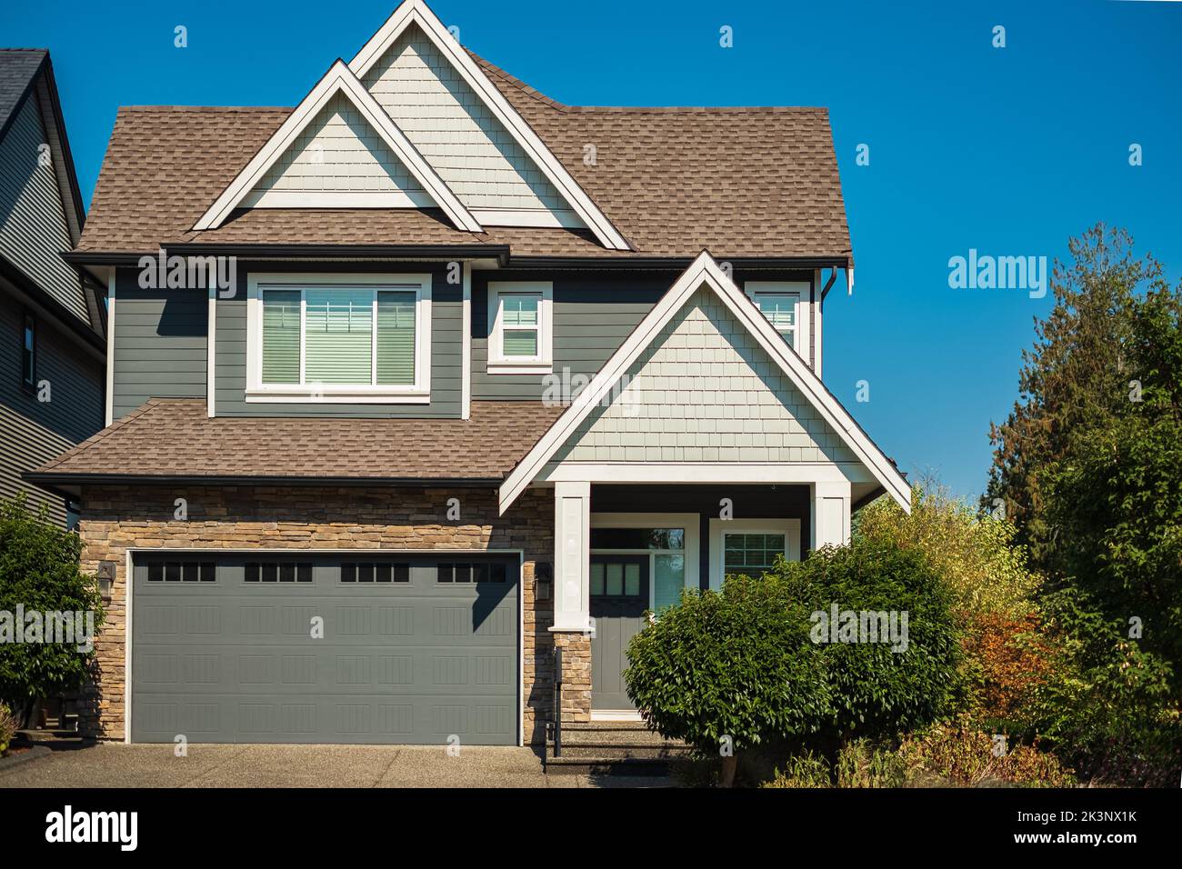 Big custom made luxury house with nicely landscaped front yard and long ...