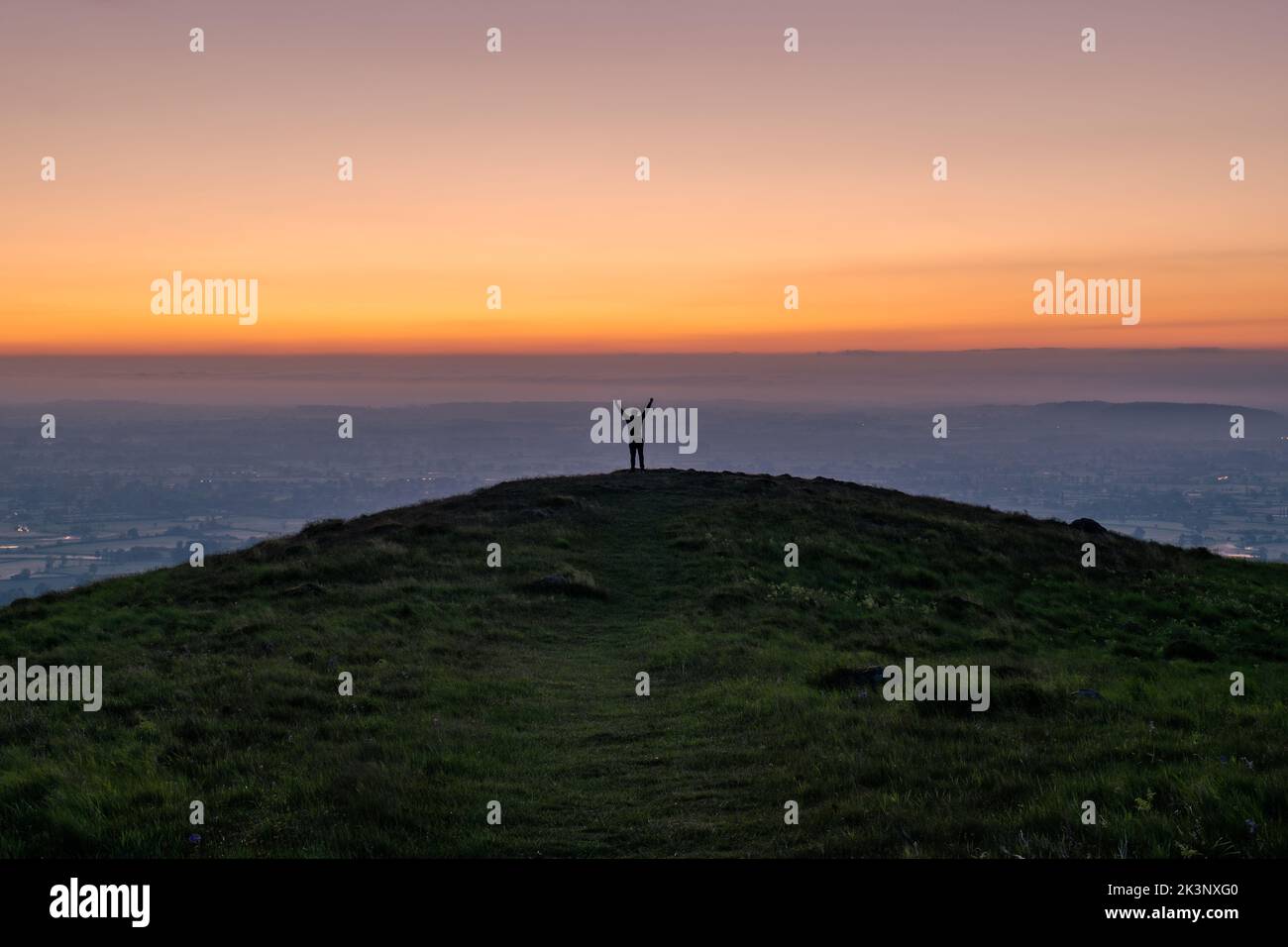A man standing on the top of the Breidden Hill in Wales Powys at ...