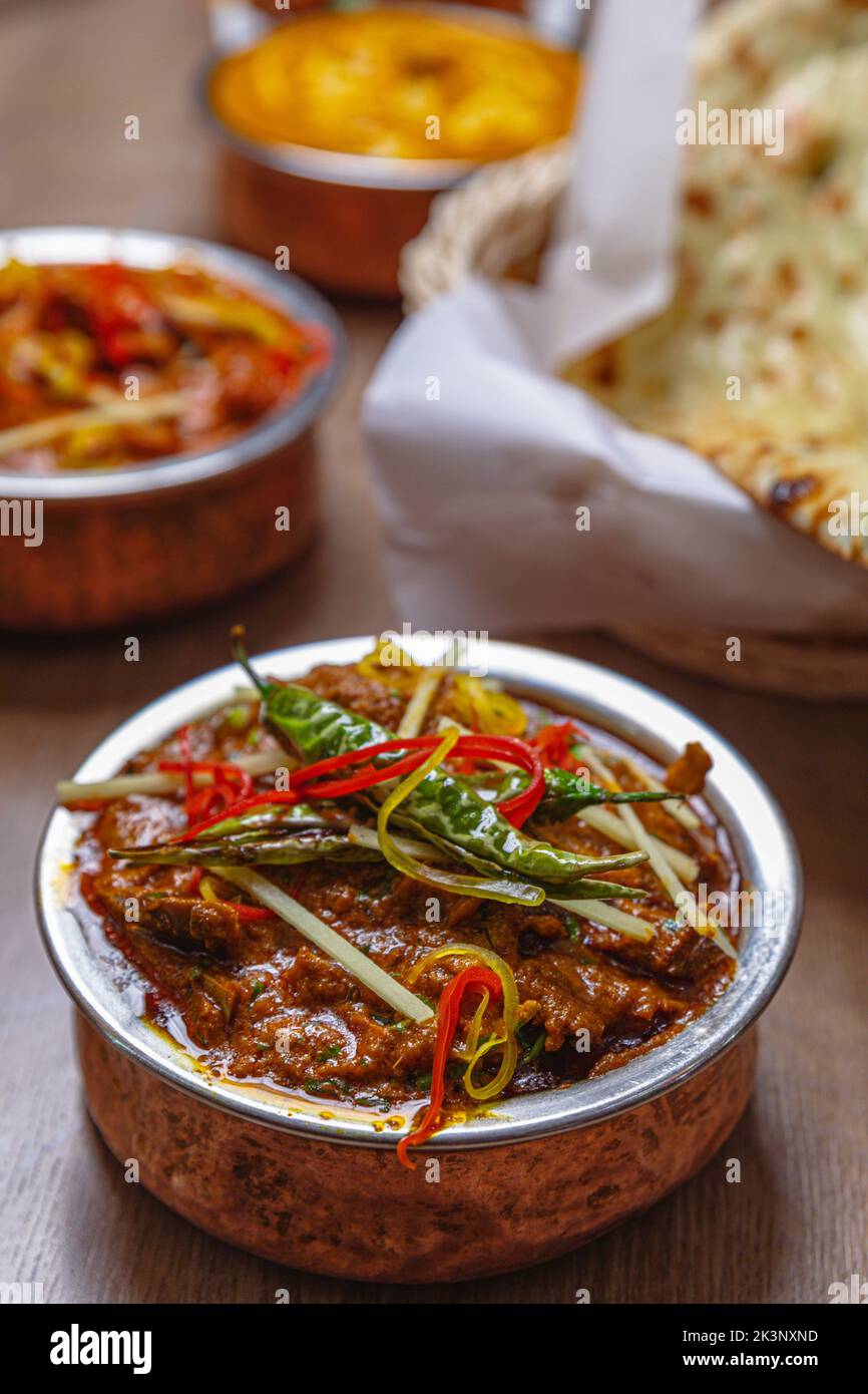 A shallow focus shot of Indian spicy Rojan josh on a table Stock Photo ...