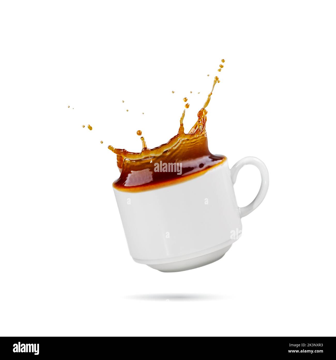 Falling coffee cup. Cup of coffee splashes while falling. Splash in ...